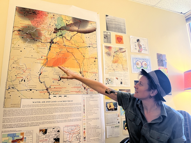 Photo | Eileen O'Shaughnessy points to the Trinity Site plume on a map ...
