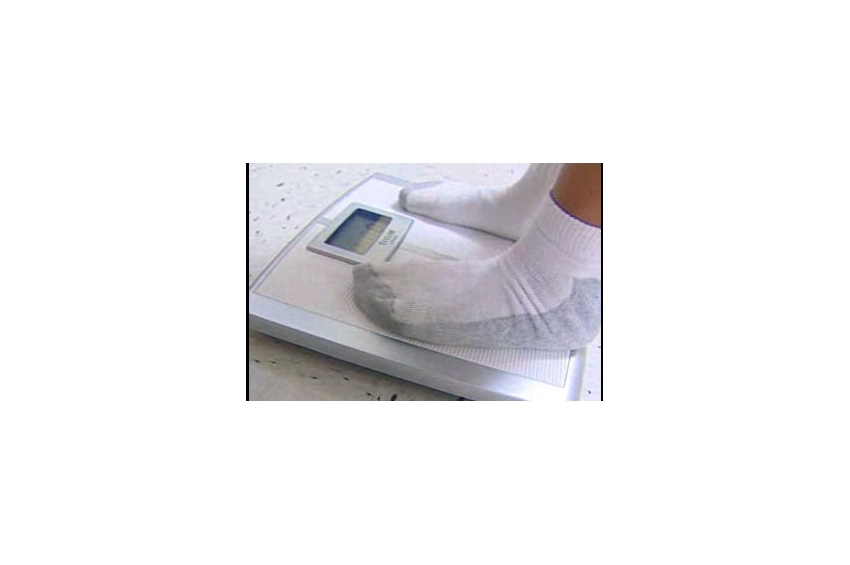 Photo | child's feet on scale | American Heart Association