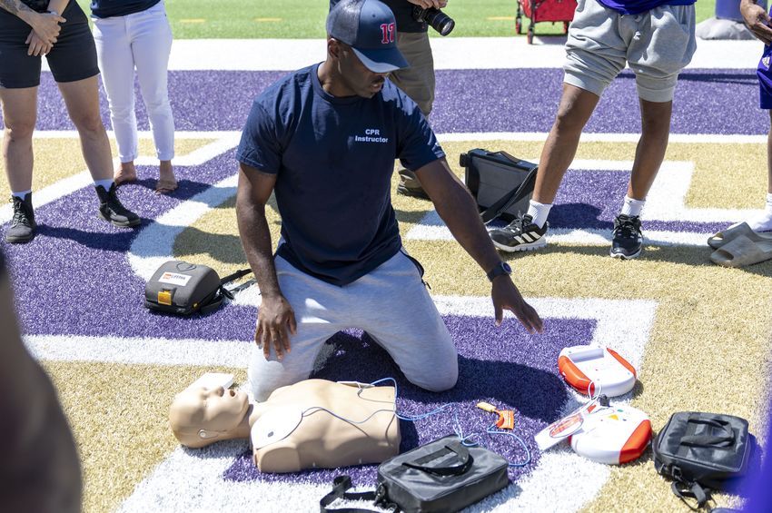 Photo | NOL - SFD Firefighter Greg Bogans demonstrates an AED ...