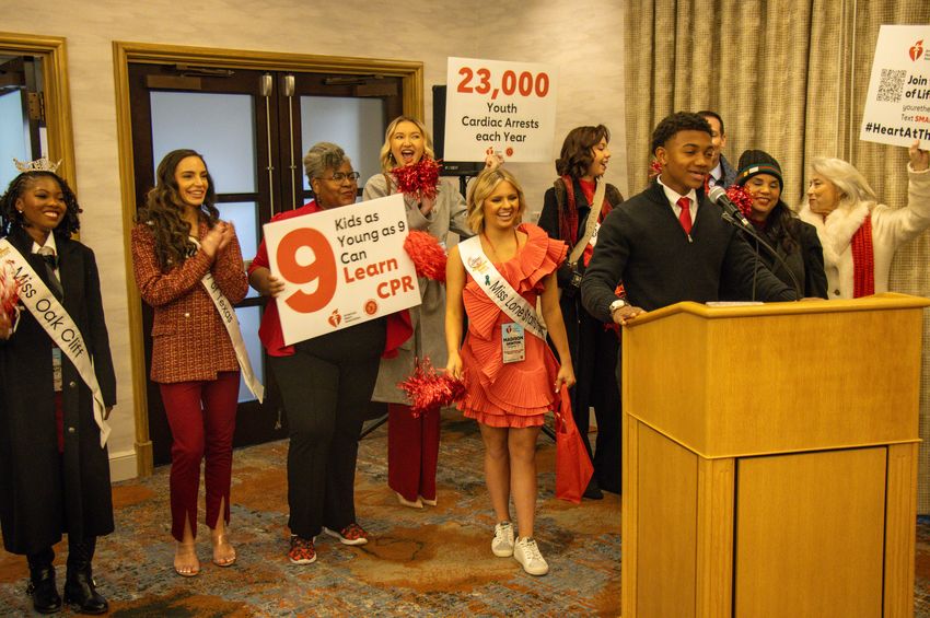 Photo | Advocates Andre Scott and Chloe Burke speak to rally crowd ...