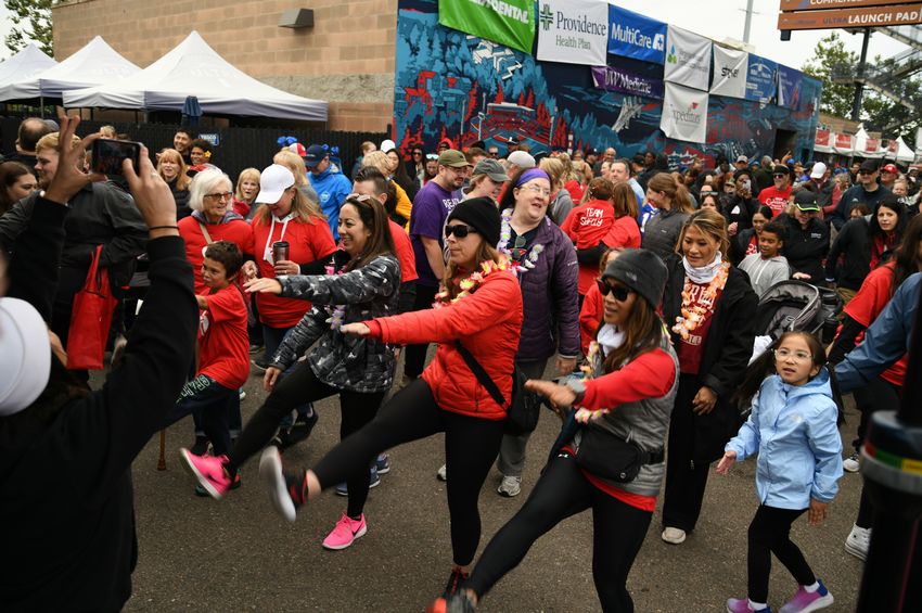 Photo | Walkers warm up before the Heart and Stroke Walk | American ...