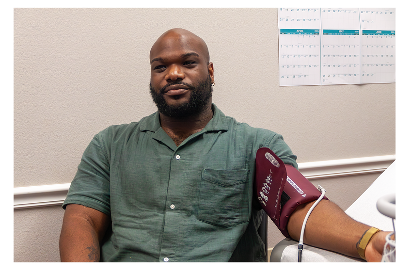 Photo | Blood pressure check on male patient | American Heart Association